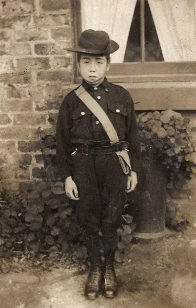 Early Boy Scout, looking rather weary possibly after a long