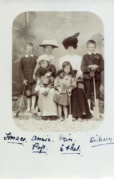 Family group Studio portrait at the seaside for two sisters