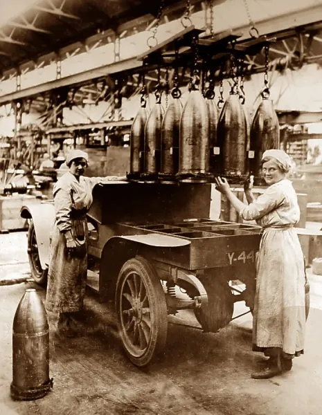 Loading shells onto a lorry in a munitions factory WW1