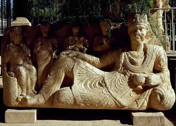 Roman sarcophagus showing the dead reclining on a couch