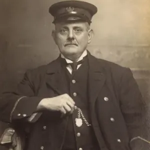 Studio portrait, Customs officer in uniform and wife